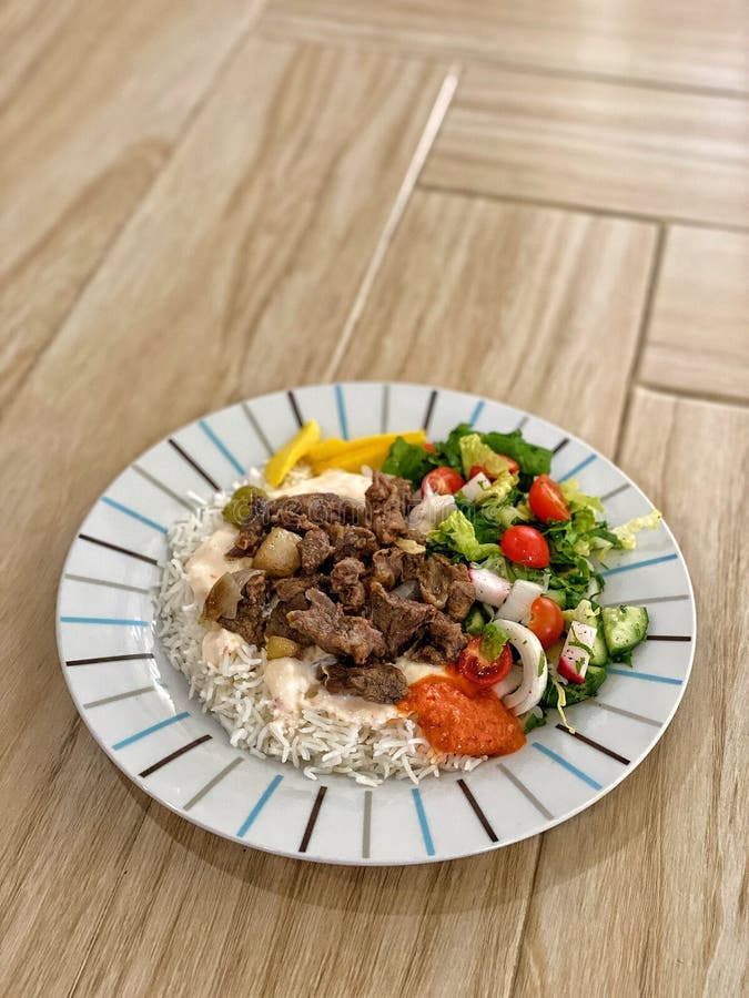 Fried Camel Meat with Rice and Salad Omani Cuisine Stock Photo - Image ...