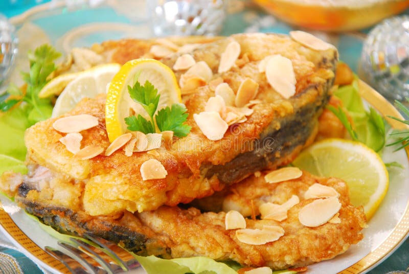Fried Carp with Almonds for Christmas Stock Photo - Image of golden ...