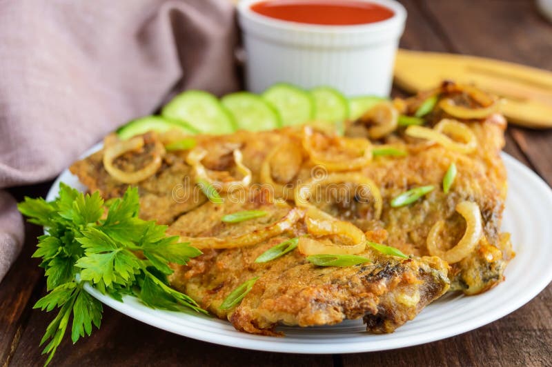 Fried Carp Fish Fillet in Batter on Wooden Table. Stock Photo - Image ...