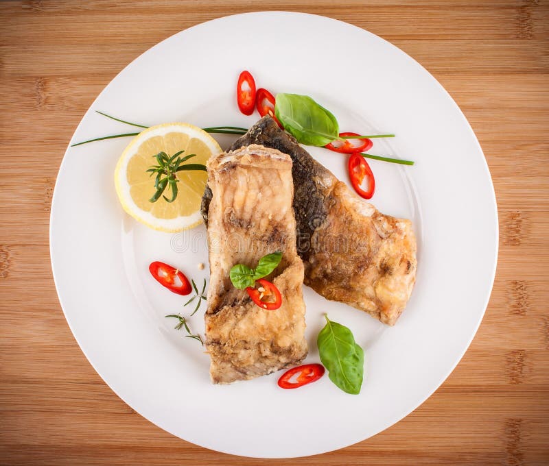 Fried carp fish pieces stock image. Image of fishing - 102037855