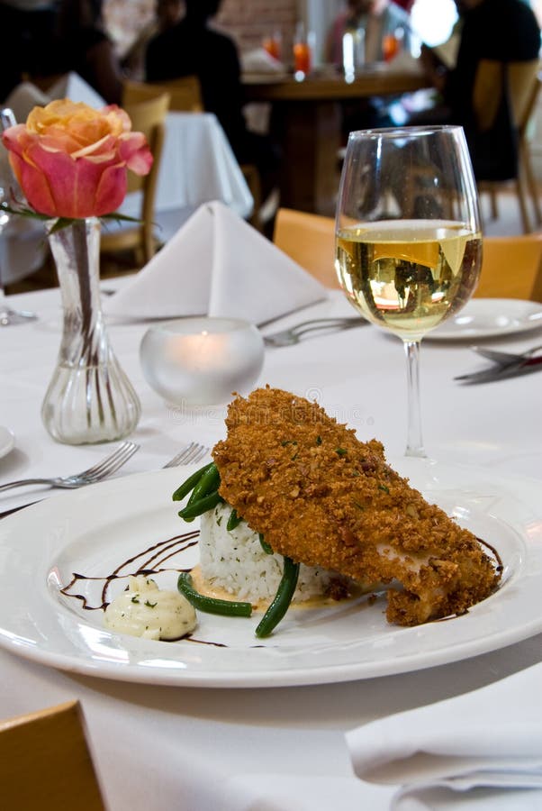 Fried catfish over rice stock photo. Image of candle - 15557502