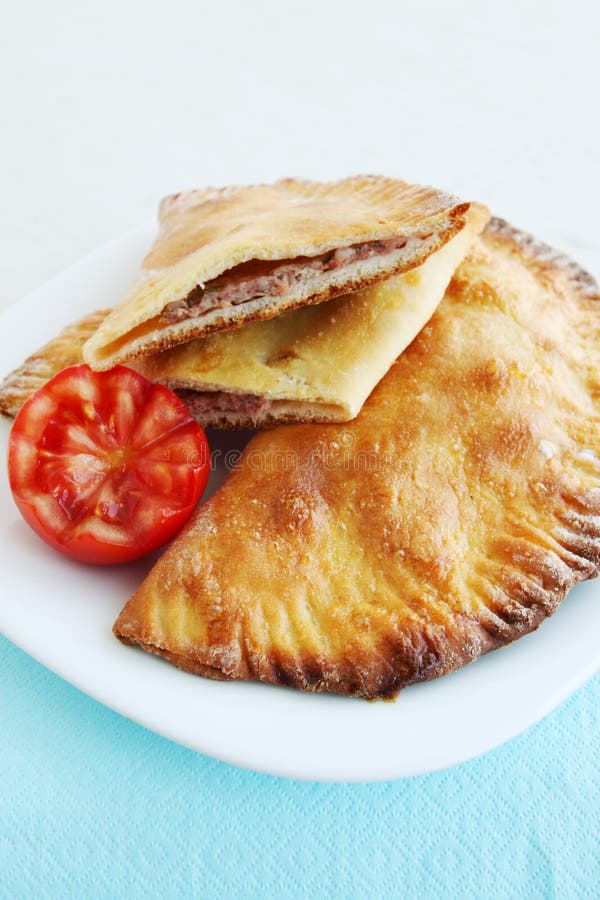 Fried cheburek with tomato stock photo. Image of cooked - 32892294