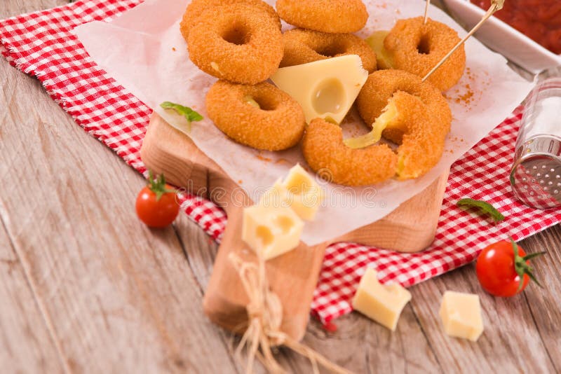 Fried cheese ring. stock photo. Image of plate, cheesy - 173888260