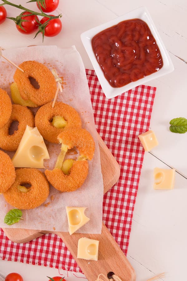 Fried cheese ring. stock photo. Image of healthy, olive - 174290774