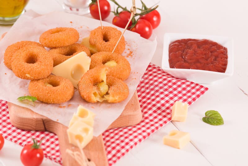 Fried cheese ring. stock photo. Image of junk, dish - 196298800