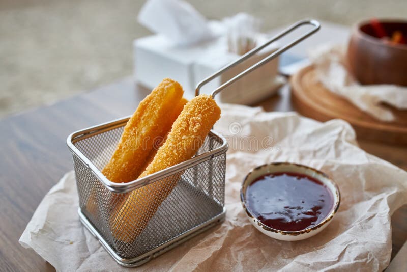 Fried Cheese with Sweet Sauce Served in a Metal Form at a Restaurant ...