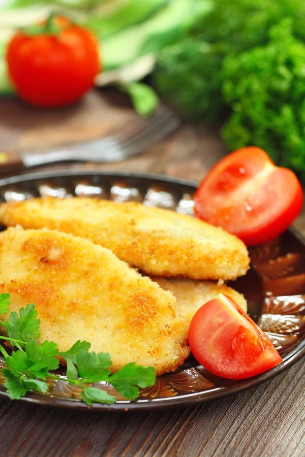 Fried chicken fillet stock image. Image of crispy, green - 91510675