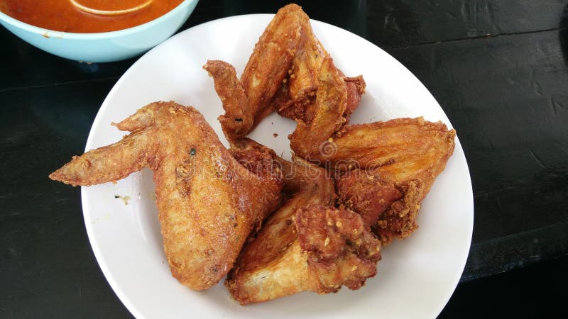 Fried Chicken with Fish Sauce Stock Photo - Image of thailand, herbs ...