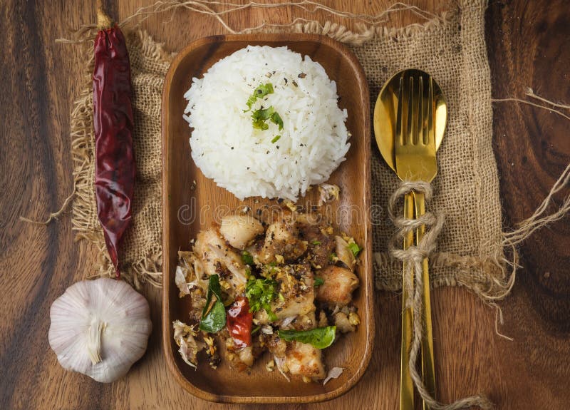 Fried Chicken with Garlic and Pepper with Rice. Thai Dish Stock Image ...