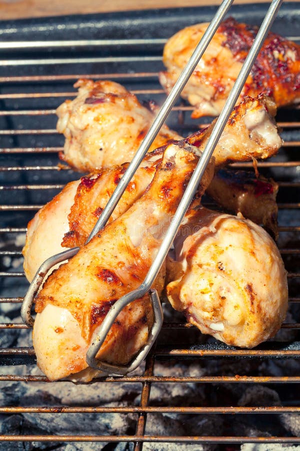 Fried chicken on the grill stock photo. Image of food - 190683564