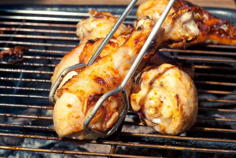 Fried chicken on the grill stock photo. Image of grate - 190683550