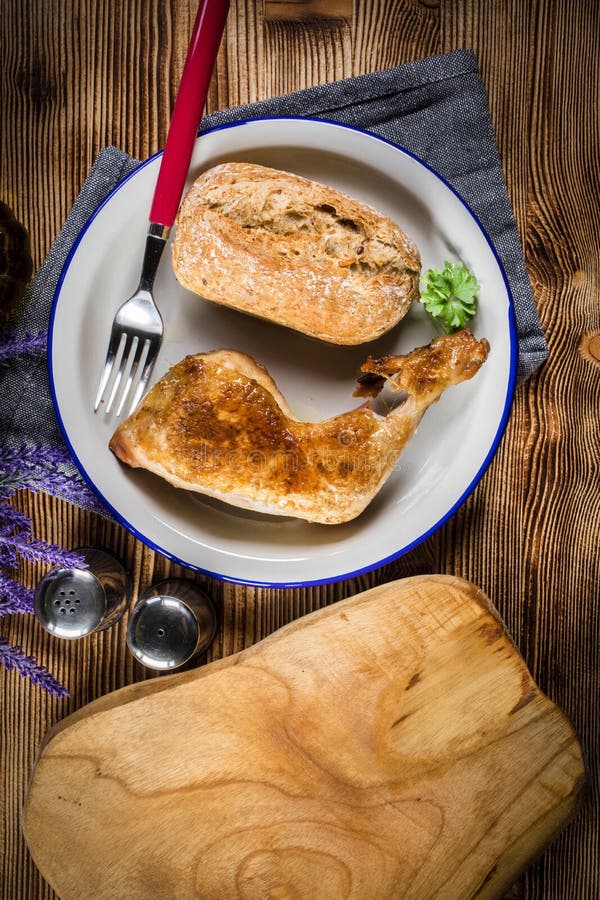 Fried Chicken Leg with Bread Roll Stock Photo - Image of wooden, food ...