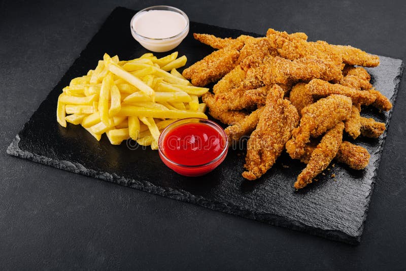 Fried Chicken, Nuggets and French Fries Stock Photo - Image of french ...