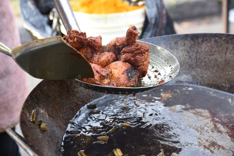 Fried Chicken with Palm Oil Stock Photo - Image of black, healthy ...