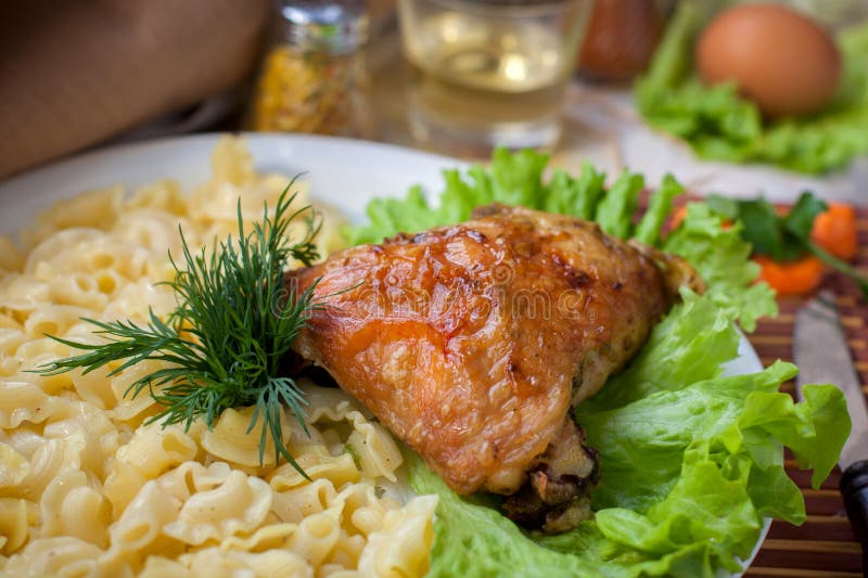 Fried chicken with pasta stock photo. Image of garnish - 69293292
