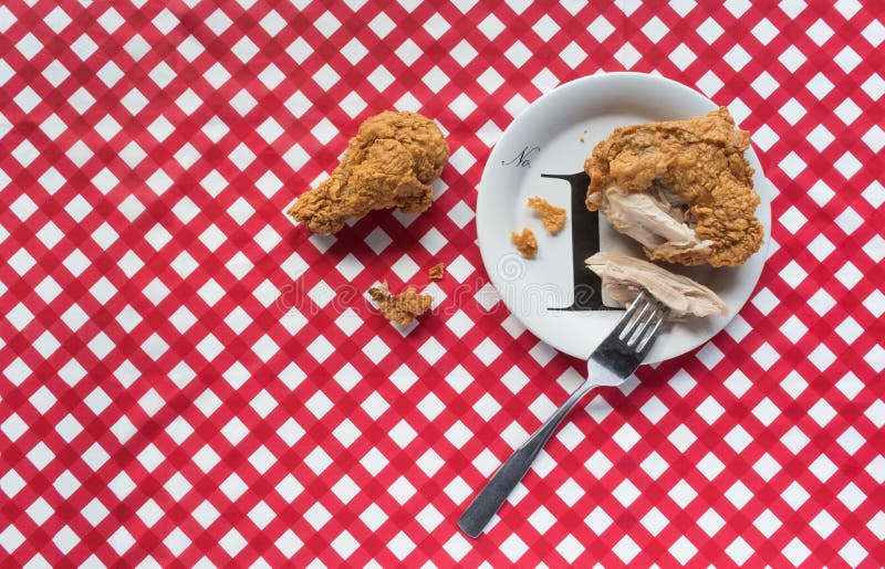 Fried Chicken on Plate with Fork on Red Checkerboard Tablecloth ...