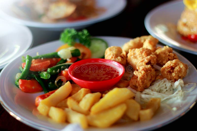 Fried Chicken Pops with Fries Stock Image - Image of cooking, cooked ...