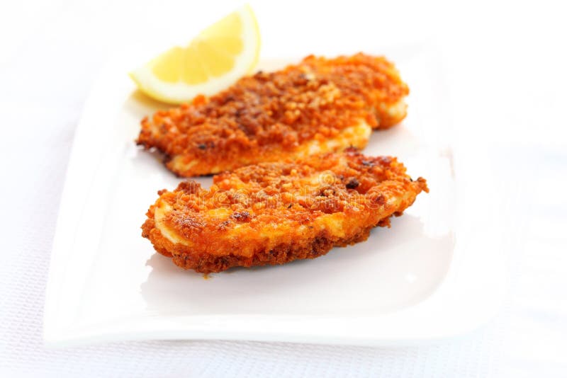 Fried chicken schnitzel stock photo. Image of garnish - 24201716