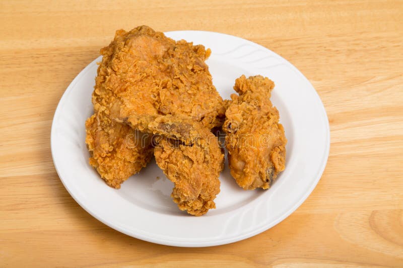 Fried Chicken on Small White Plate and Wood Table Stock Image - Image ...