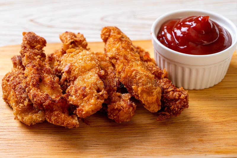 Fried chicken stick stock image. Image of closeup, crumbs - 184548599