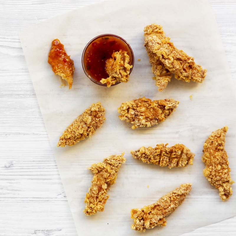 Fried Chicken Strips with Sauce on White Wooden Surface, Top View. Flat ...