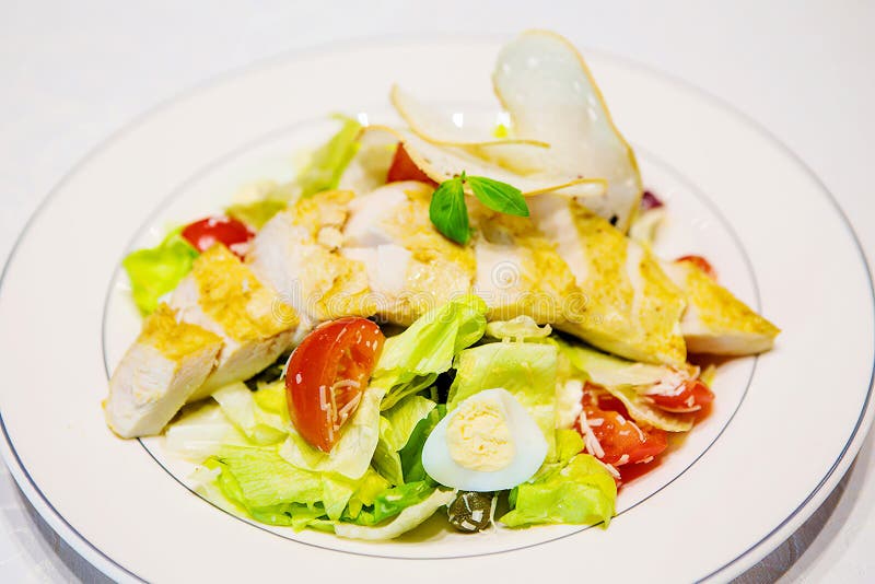 Fried Chicken with Vegetable Garnish on a Plate. Stock Photo - Image of ...