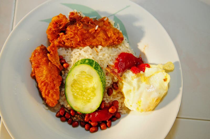 Fried Chicken Wing, Rice, Cucumber and Eggs Stock Photo - Image of ...