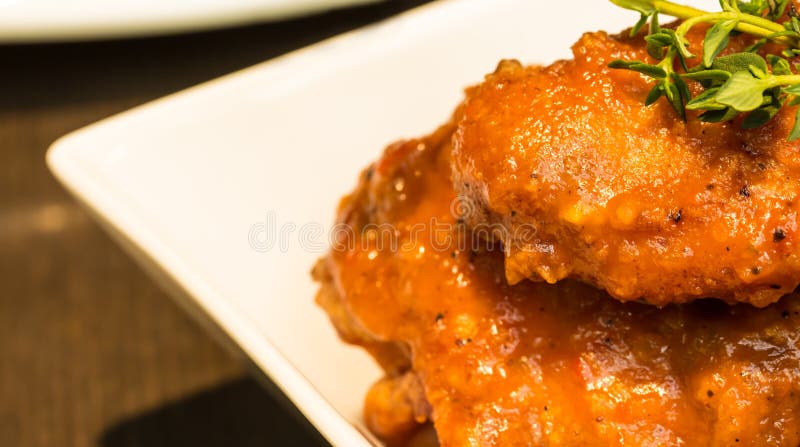 Fried Chicken Wing on White Plate Closeup View Stock Image - Image of ...