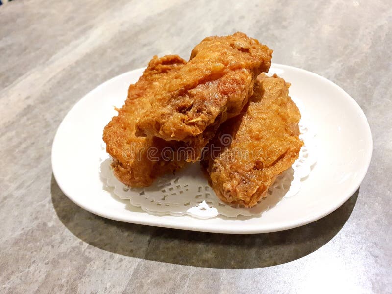 Fried chicken winglet stock image. Image of closeup - 274463329