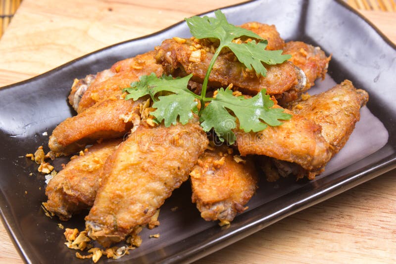 Fried Chicken Wings on Plate Stock Photo - Image of chef, decorated ...