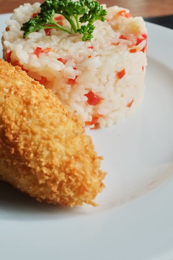 Plate of Round Rice and Fried Chop Stock Photo - Image of round, brown ...
