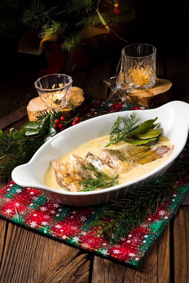 A Fried Christmas Carp in Butter Sauce with Dill and Lemon Stock Image ...