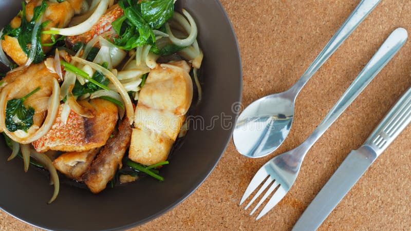 Fried Coal Fish Fillet with Onion. Stock Image - Image of foam, green ...