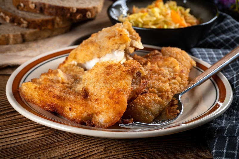 Fried cod fillet stock photo. Image of fish, salad, sauerkraut - 279108022