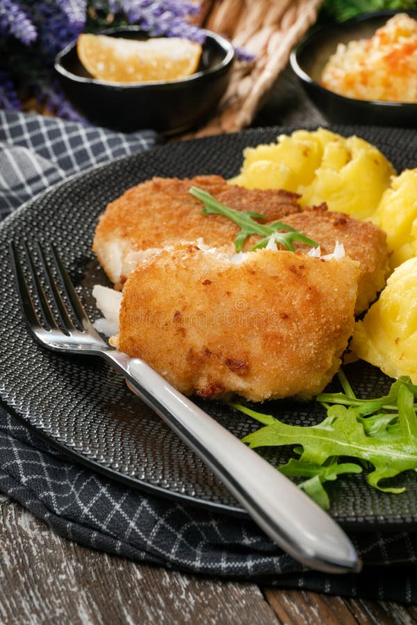 Fried cod fillet served stock photo. Image of boiled - 274488864