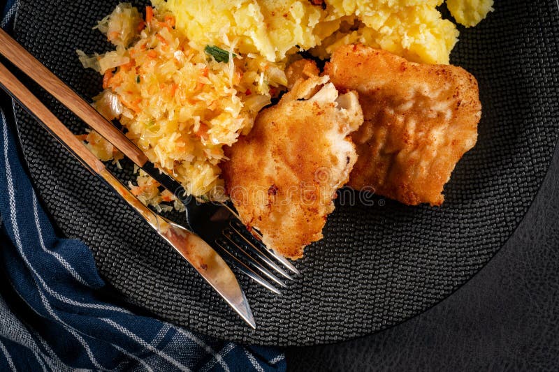 Fried cod fillet served stock image. Image of salad - 299878779