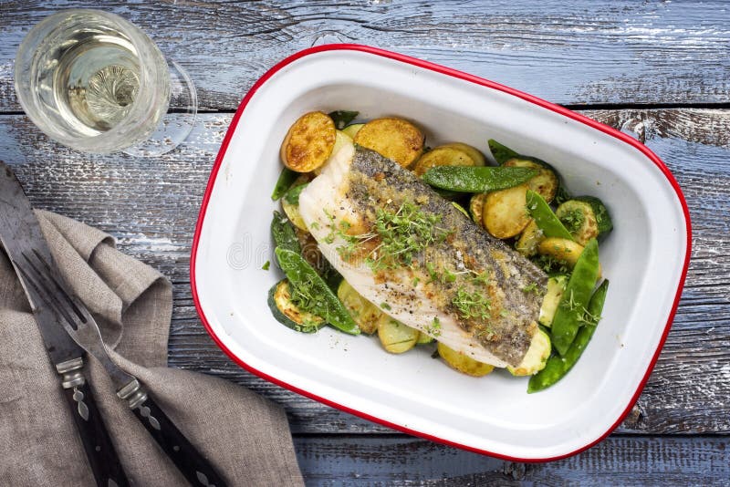 Fried Cod Fish Fillet with Vegetable and Potatoes in a Roasting Tin ...