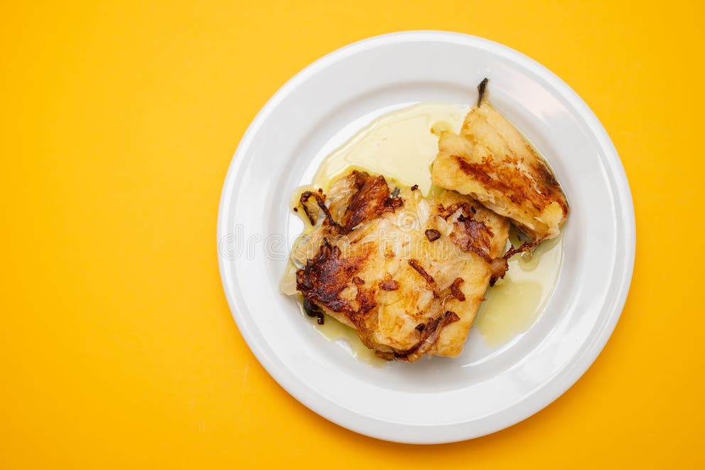 Fried Cod Fish with Olive Oil on White Dish Stock Image - Image of ...