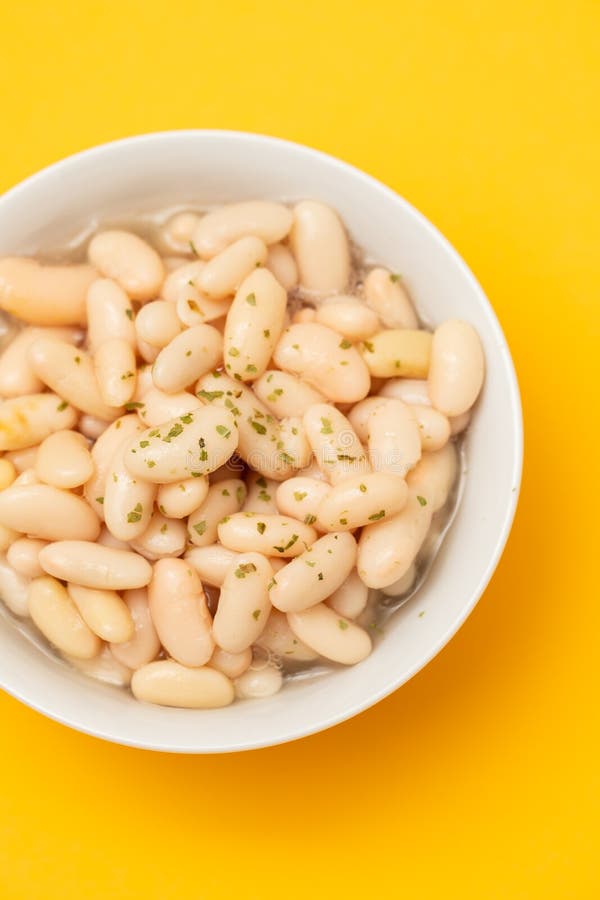 Fried Cod Fish with White Beans on the Plate Stock Image - Image of ...