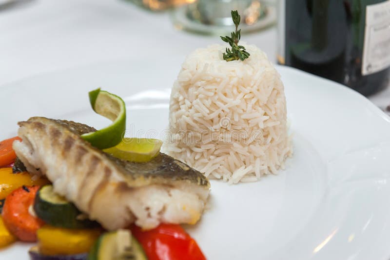 Fried cod with rice stock image. Image of delicious, diet - 56858159