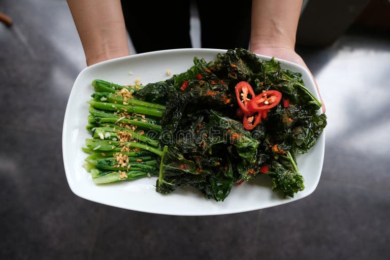 Fried Cooked Green Vegetables Called Kailan Served on a Restaurant ...