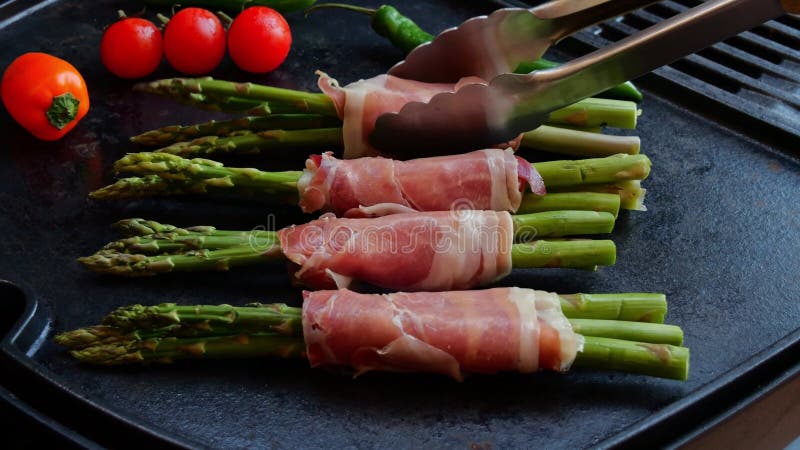 Fried, Cooking on Grill Green Asparagus Wrapped in Jamon Stock Video ...