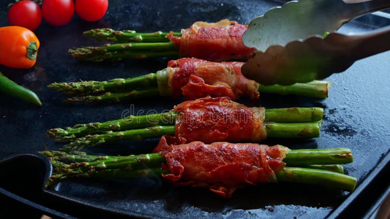 Fried, Cooking on Grill Green Asparagus Wrapped in Jamon Stock Footage ...