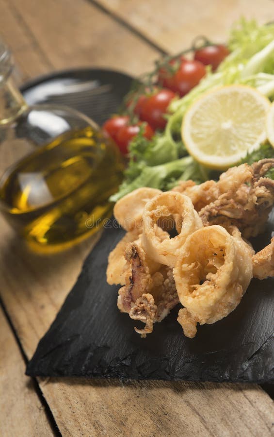 Fried Crispy Calamari Served on Plate Stock Photo - Image of lemon ...