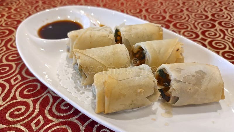 Fried Crispy Chinese Spring Roll on White Plate Stock Photo - Image of ...