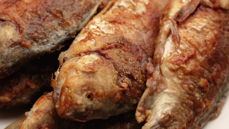 Fried Crucian Carp Fish on a Plate, Circular Camera Movement Stock ...