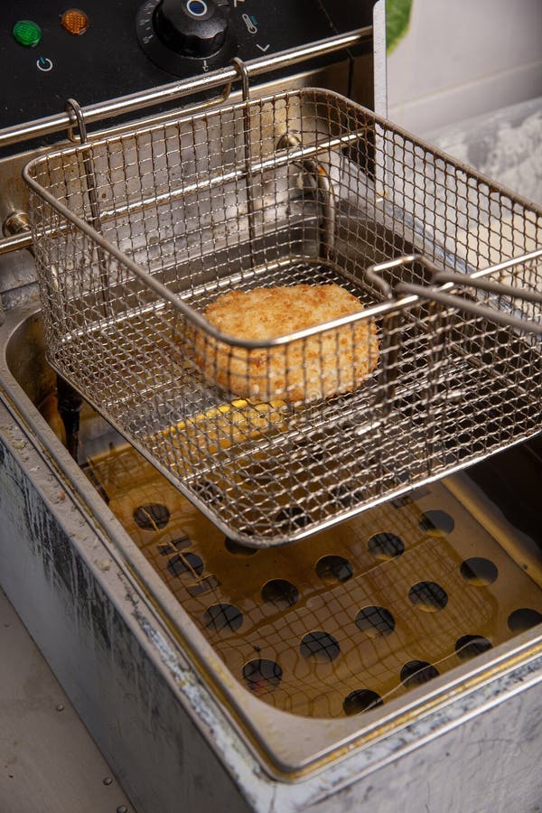 Fried Cutlet in Fryer Basket Stock Image - Image of handle, crockery ...