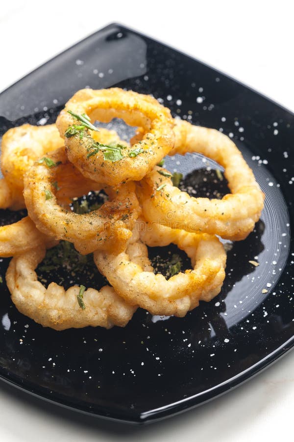 Fried Cuttlefish Rings in Batter Stock Photo - Image of indoors ...