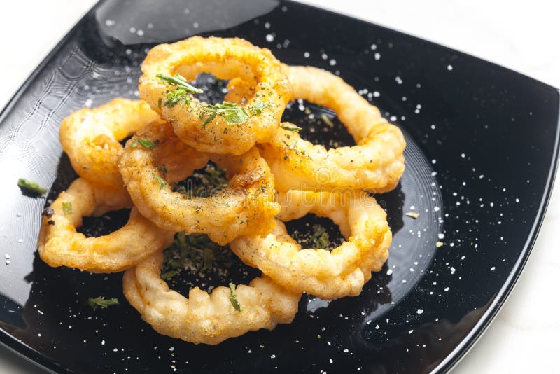 Fried Cuttlefish Rings in Batter Stock Photo - Image of fried, food ...