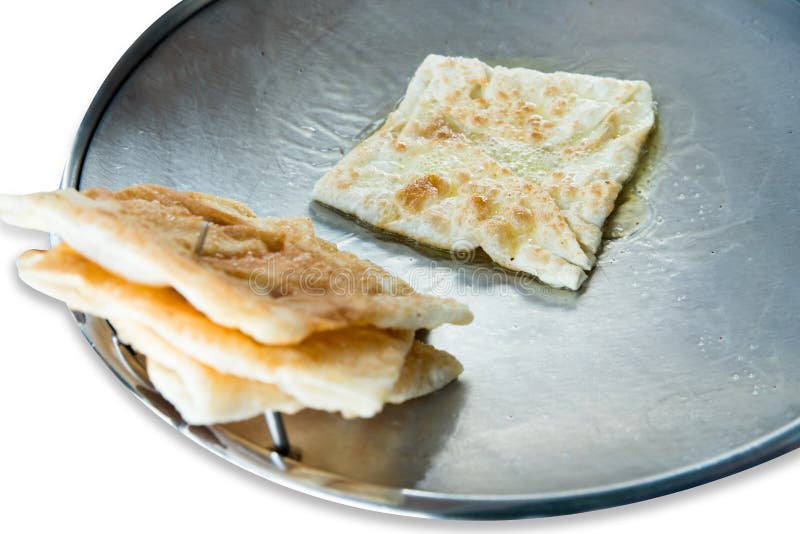 Fried Delicious Roti on a Hot Pan, White Background, Focus Selective ...